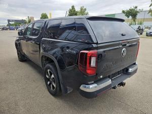 Black Volkswagen Amarok 2023 in Siauliai, with an engine capacity of 3.00 L and mileage of 270 thousand km for 22900 €, photo 5 on AUTOMOTO.COM.LV