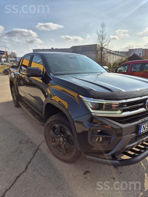 Black Volkswagen Amarok 2024 in Rezekne, with an engine capacity of 3.00 L and mileage of 72 thousand km for 47500 €, photo 7 on AUTOMOTO.COM.LV