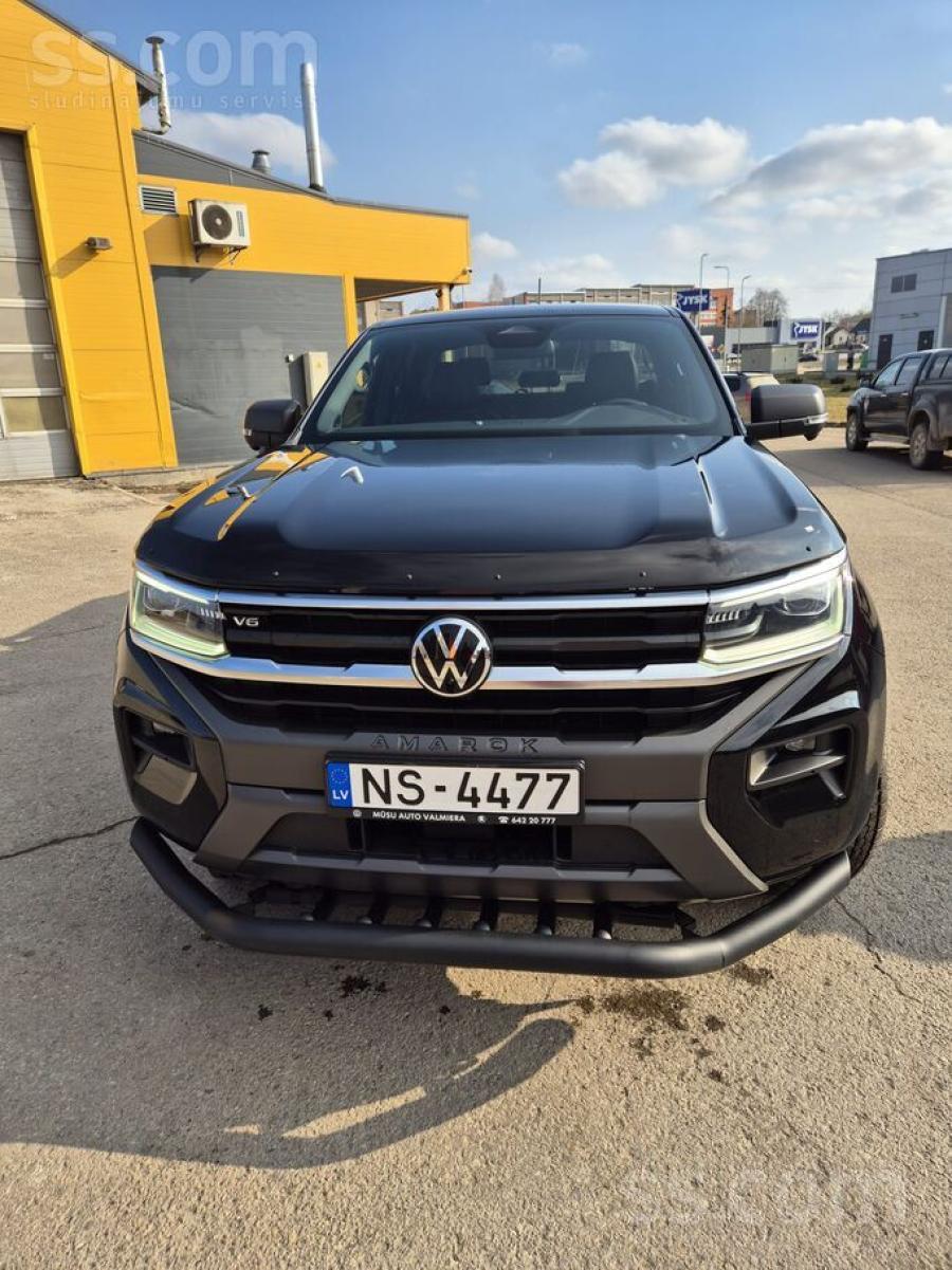 Black Volkswagen Amarok 2024 in Rezekne, with an engine capacity of 3.00 L and mileage of 72 thousand km for 47500 €, photo 1 on AUTOMOTO.COM.LV