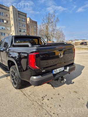 Black Volkswagen Amarok 2024 in Rezekne, with an engine capacity of 3.00 L and mileage of 72 thousand km for 47500 €, photo 5 on AUTOMOTO.COM.LV