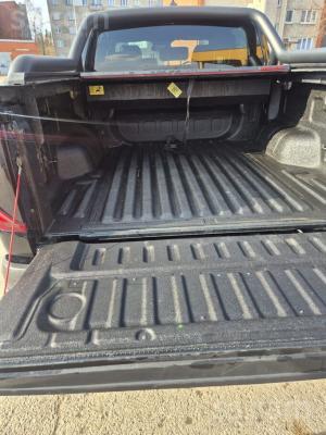 Black Volkswagen Amarok 2024 in Rezekne, with an engine capacity of 3.00 L and mileage of 72 thousand km for 47500 €, photo 10 on AUTOMOTO.COM.LV