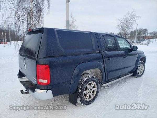 Blue Volkswagen Amarok 2014 in Tartu, with an engine capacity of 2.00 L and mileage of 202 thousand km for 10900 €, photo 7 on AUTOMOTO.COM.LV