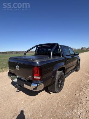 Blue Volkswagen Amarok 2020 in Daugavpils, with an engine capacity of 3.00 L and mileage of 245 thousand km for 19000 €, photo 4 on AUTOMOTO.COM.LV