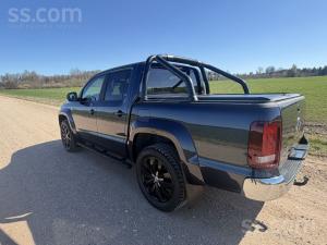 Blue Volkswagen Amarok 2020 in Daugavpils, with an engine capacity of 3.00 L and mileage of 245 thousand km for 19000 €, photo 5 on AUTOMOTO.COM.LV