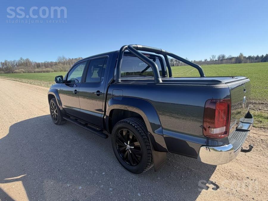Blue Volkswagen Amarok 2020 in Daugavpils, with an engine capacity of 3.00 L and mileage of 245 thousand km for 19000 €, photo 5 on AUTOMOTO.COM.LV