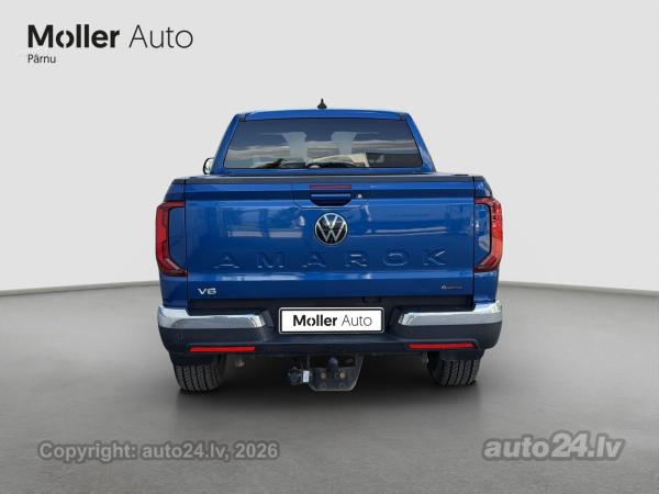 Blue Volkswagen Amarok 2024 in Parnu, with an engine capacity of 3.00 L and mileage of 99 thousand km for 47900 €, photo 4 on AUTOMOTO.COM.LV