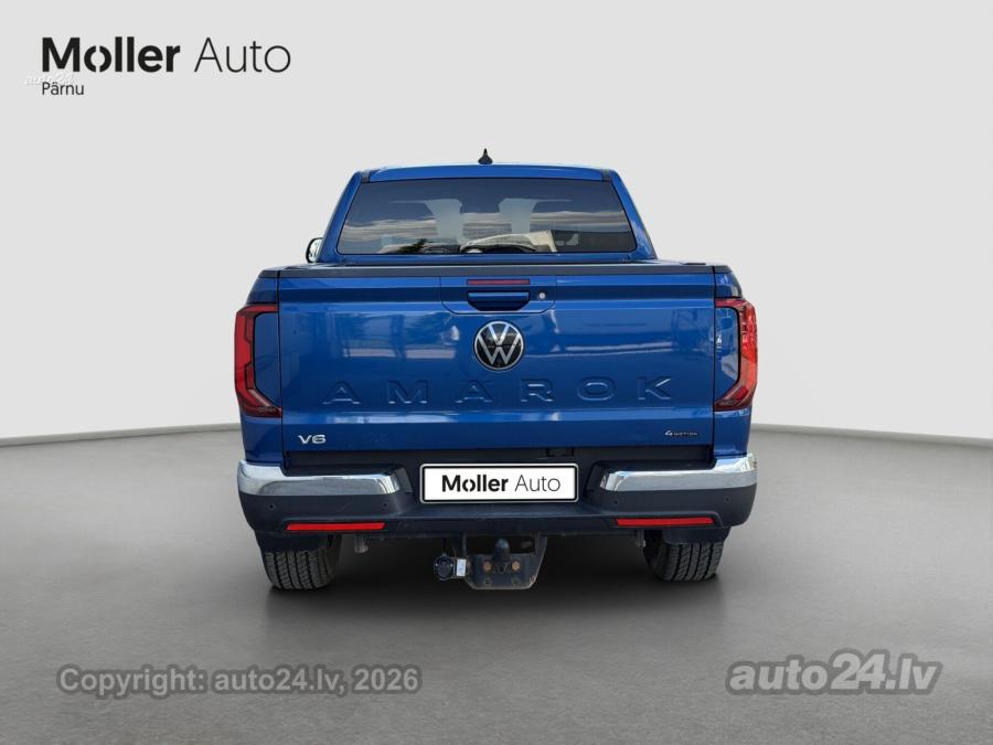 Blue Volkswagen Amarok 2024 in Parnu, with an engine capacity of 3.00 L and mileage of 99 thousand km for 47900 €, photo 5 on AUTOMOTO.COM.LV