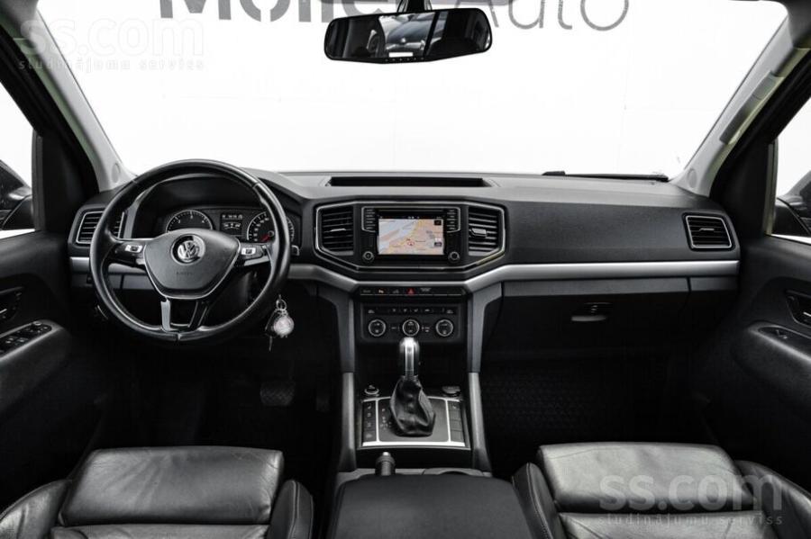 Blue Volkswagen Amarok 2018 in Riga, with an engine capacity of 3.00 L and mileage of 239 thousand km for 21850 €, photo 7 on AUTOMOTO.COM.LV