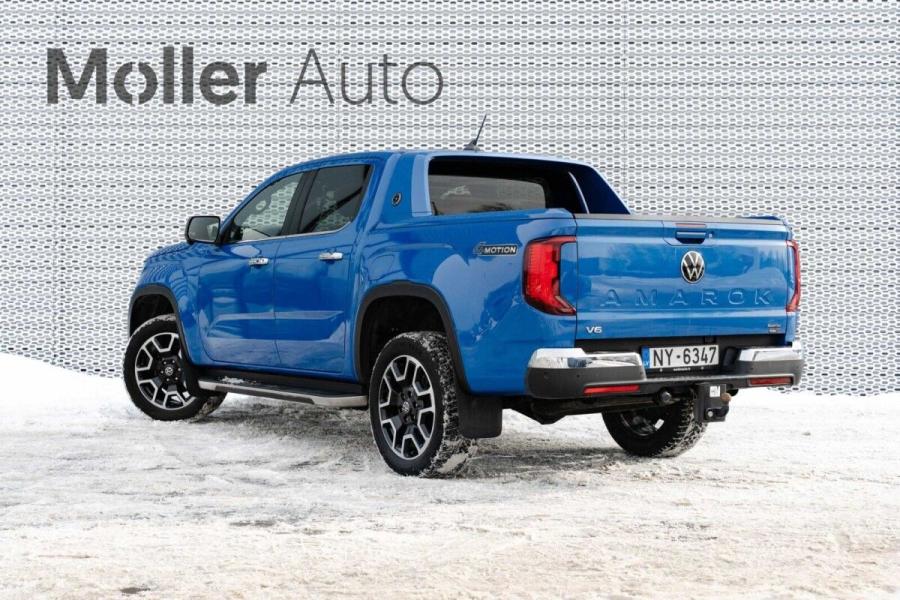 Blue Volkswagen Amarok 2024 in Marupe, with an engine capacity of 3.00 L and mileage of 80 thousand km for 42900 €, photo 4 on AUTOMOTO.COM.LV
