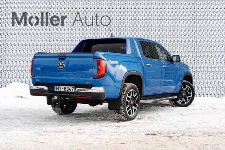 Blue Volkswagen Amarok 2024 in Marupe, with an engine capacity of 3.00 L and mileage of 80 thousand km for 42900 €, photo 5 on AUTOMOTO.COM.LV