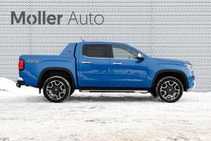 Blue Volkswagen Amarok 2024 in Marupe, with an engine capacity of 3.00 L and mileage of 80 thousand km for 42900 €, photo 6 on AUTOMOTO.COM.LV