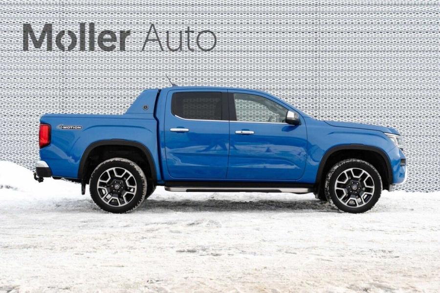 Blue Volkswagen Amarok 2024 in Marupe, with an engine capacity of 3.00 L and mileage of 80 thousand km for 42900 €, photo 6 on AUTOMOTO.COM.LV