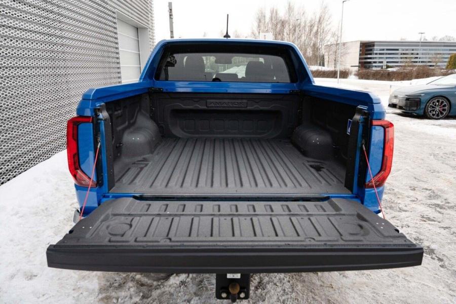 Blue Volkswagen Amarok 2024 in Marupe, with an engine capacity of 3.00 L and mileage of 80 thousand km for 42900 €, photo 22 on AUTOMOTO.COM.LV