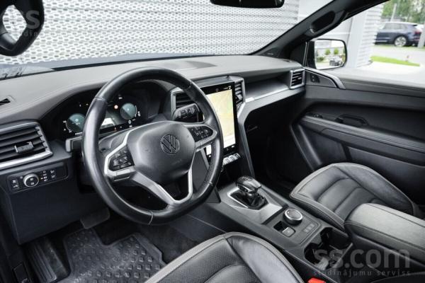 Blue Volkswagen Amarok 2024 in Riga, with an engine capacity of 3.00 L and mileage of 93 thousand km for 45900 €, photo 9 on AUTOMOTO.COM.LV