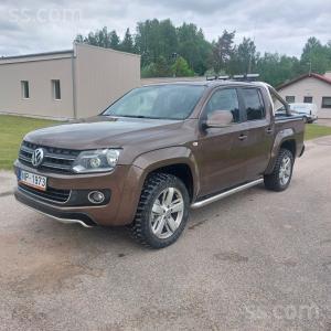 Brown Volkswagen Amarok 2011 in Riga, with an engine capacity of 2.00 L and mileage of 346 thousand km for 8699 €, photo  on AUTOMOTO.COM.LV