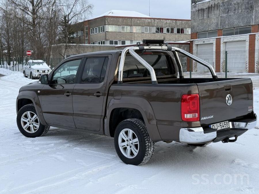 Brown Volkswagen Amarok 2012 in Aizkraukle, with an engine capacity of 2.00 L and mileage of 273 thousand km for 12470 €, photo 2 on AUTOMOTO.COM.LV