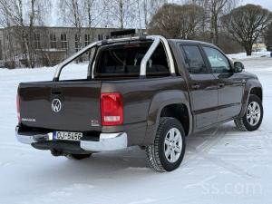 Brown Volkswagen Amarok 2012 in Aizkraukle, with an engine capacity of 2.00 L and mileage of 273 thousand km for 12470 €, photo 3 on AUTOMOTO.COM.LV