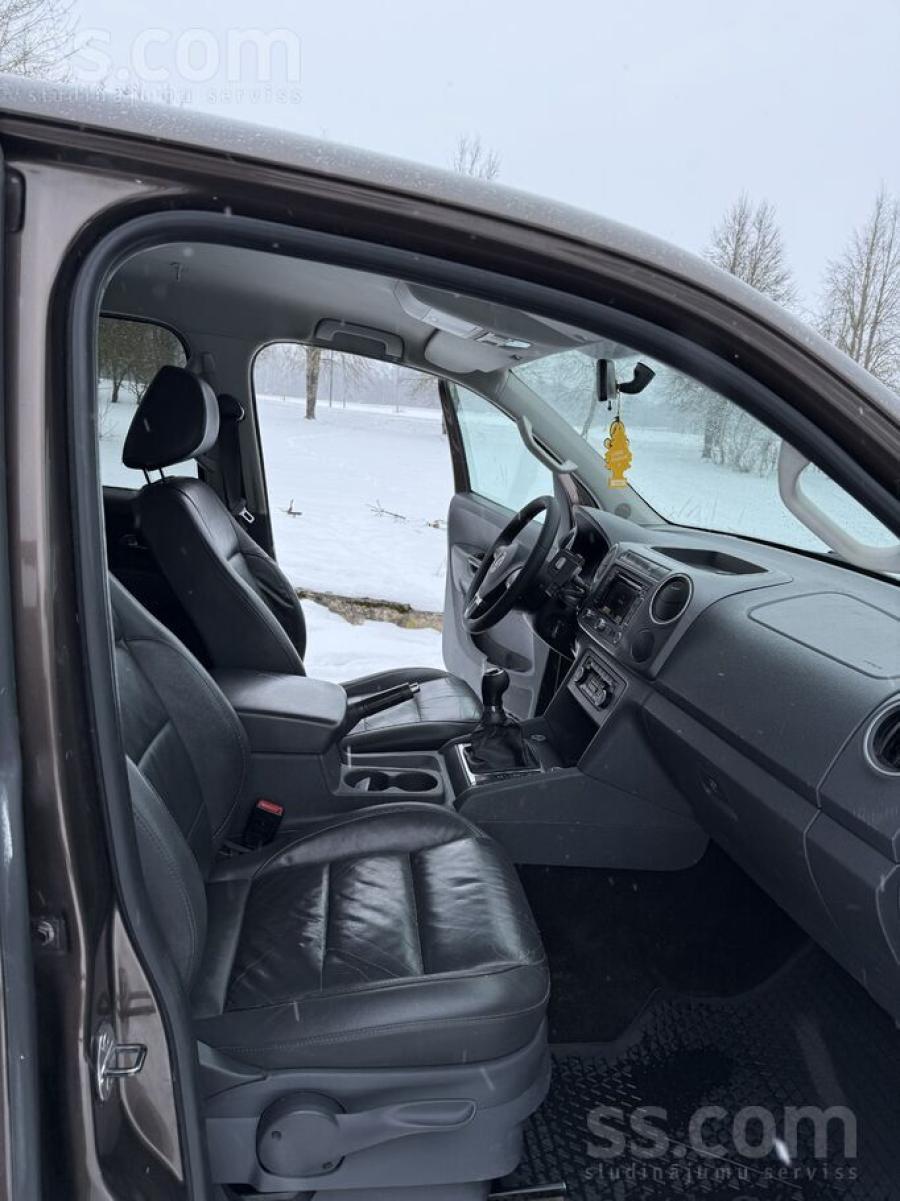 Brown Volkswagen Amarok 2012 in Aizkraukle, with an engine capacity of 2.00 L and mileage of 273 thousand km for 12470 €, photo 12 on AUTOMOTO.COM.LV