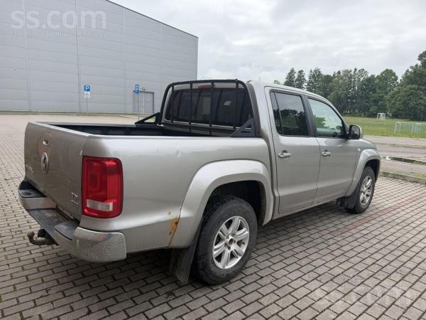 Brūns Volkswagen Amarok 2013 Liepāja, ar dzinēja tilpumu 2.00 L un nobraukumu 296 tūkst. km par 8500 €, foto 4 vietnē AUTOMOTO.COM.LV