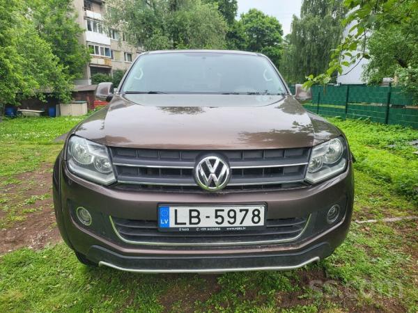 Brown Volkswagen Amarok 2010 in Riga, with an engine capacity of 2.00 L and mileage of 309 thousand km for 7300 €, photo 1 on AUTOMOTO.COM.LV