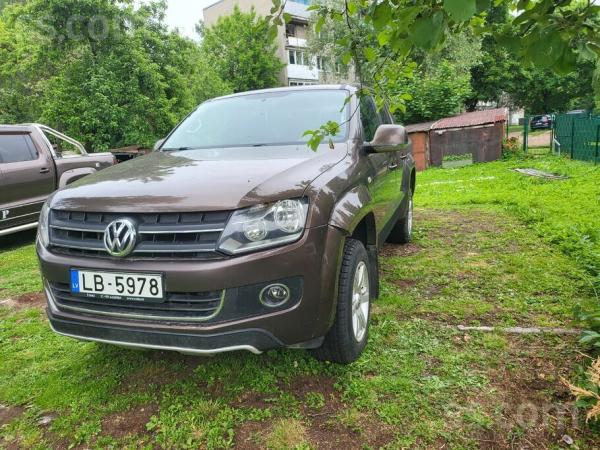 Brown Volkswagen Amarok 2010 in Riga, with an engine capacity of 2.00 L and mileage of 309 thousand km for 7300 €, photo 3 on AUTOMOTO.COM.LV