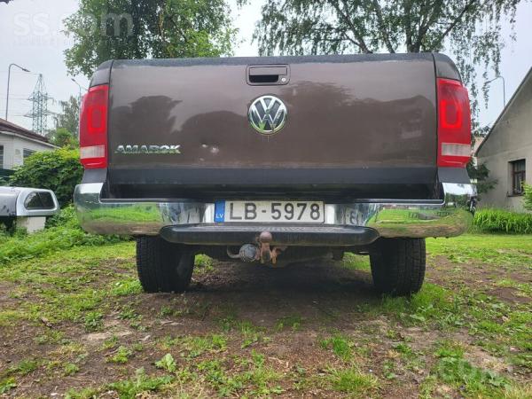 Brown Volkswagen Amarok 2010 in Riga, with an engine capacity of 2.00 L and mileage of 309 thousand km for 7300 €, photo 8 on AUTOMOTO.COM.LV