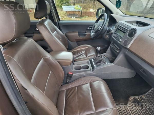 Brown Volkswagen Amarok 2010 in Riga, with an engine capacity of 2.00 L and mileage of 309 thousand km for 7300 €, photo 9 on AUTOMOTO.COM.LV