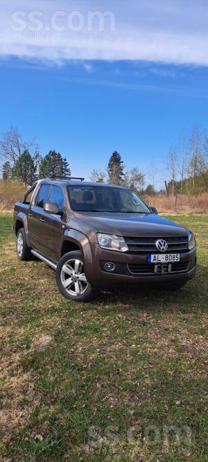 Brown Volkswagen Amarok 2011 in Jekabpils, with an engine capacity of 2.00 L and mileage of 258 thousand km for 8100 €, photo  on AUTOMOTO.COM.LV