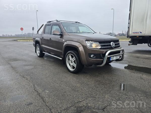 Brown Volkswagen Amarok 2012 in Bauska, with an engine capacity of 2.00 L and mileage of 350 thousand km for 13750 €, photo 1 on AUTOMOTO.COM.LV