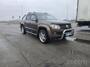 Brown Volkswagen Amarok 2012 in Bauska, with an engine capacity of 2.00 L and mileage of 350 thousand km for 13750 €, photo  on AUTOMOTO.COM.LV