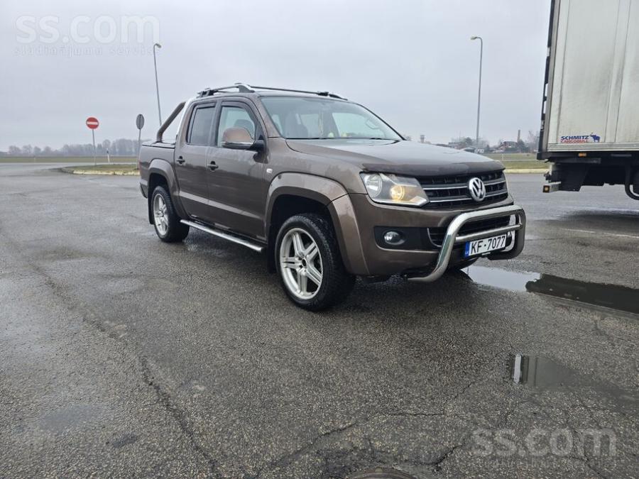 Brown Volkswagen Amarok 2012 in Bauska, with an engine capacity of 2.00 L and mileage of 350 thousand km for 13750 €, photo 1 on AUTOMOTO.COM.LV