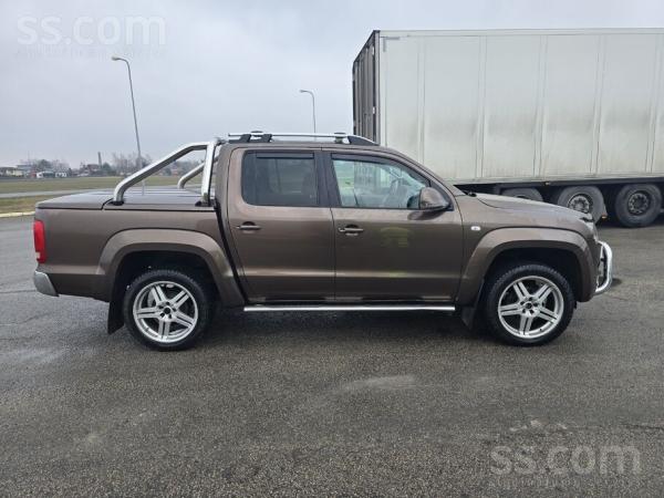 Brown Volkswagen Amarok 2012 in Bauska, with an engine capacity of 2.00 L and mileage of 350 thousand km for 13750 €, photo 2 on AUTOMOTO.COM.LV