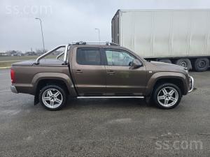 Brown Volkswagen Amarok 2012 in Bauska, with an engine capacity of 2.00 L and mileage of 350 thousand km for 13750 €, photo 2 on AUTOMOTO.COM.LV