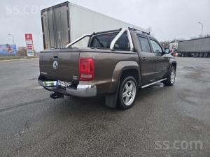 Brown Volkswagen Amarok 2012 in Bauska, with an engine capacity of 2.00 L and mileage of 350 thousand km for 13750 €, photo 3 on AUTOMOTO.COM.LV