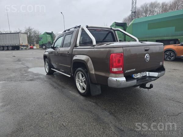 Brown Volkswagen Amarok 2012 in Bauska, with an engine capacity of 2.00 L and mileage of 350 thousand km for 13750 €, photo 4 on AUTOMOTO.COM.LV