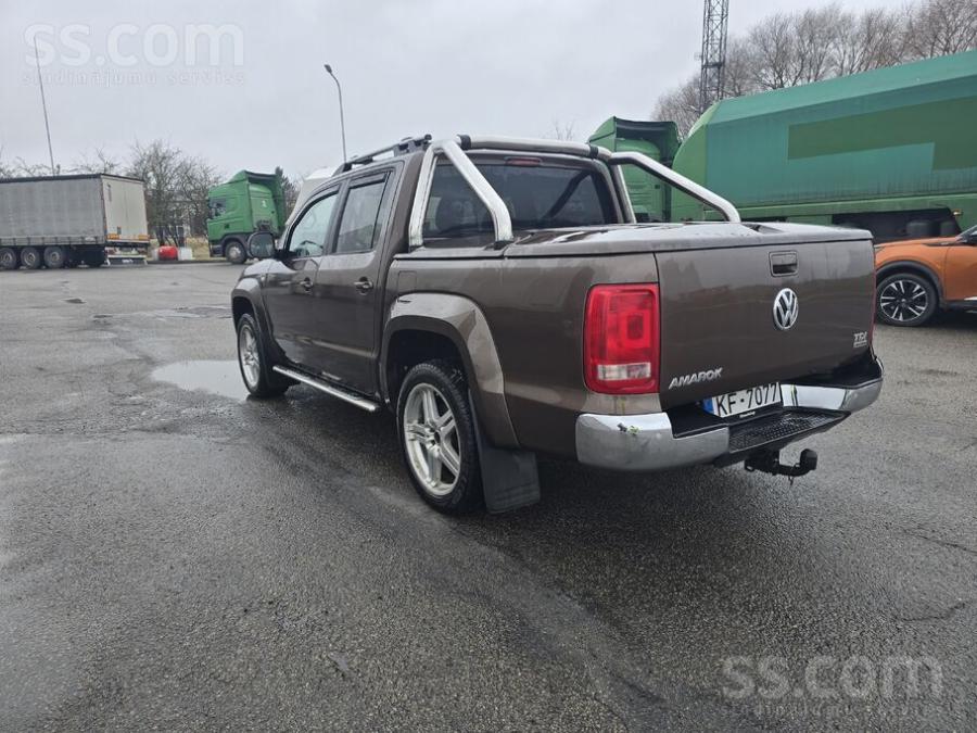 Brown Volkswagen Amarok 2012 in Bauska, with an engine capacity of 2.00 L and mileage of 350 thousand km for 13750 €, photo 4 on AUTOMOTO.COM.LV