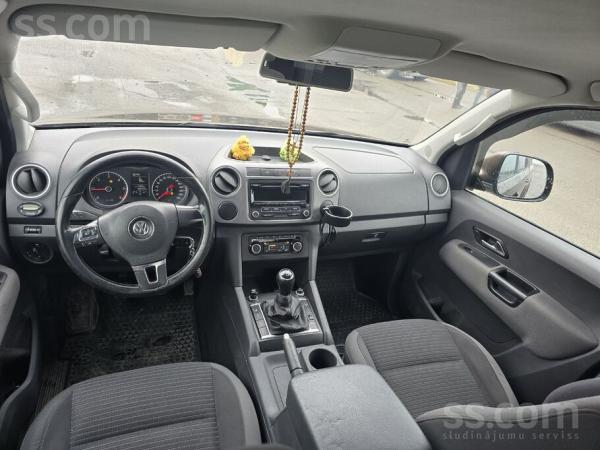 Brown Volkswagen Amarok 2012 in Bauska, with an engine capacity of 2.00 L and mileage of 350 thousand km for 12300 €, photo 7 on AUTOMOTO.COM.LV