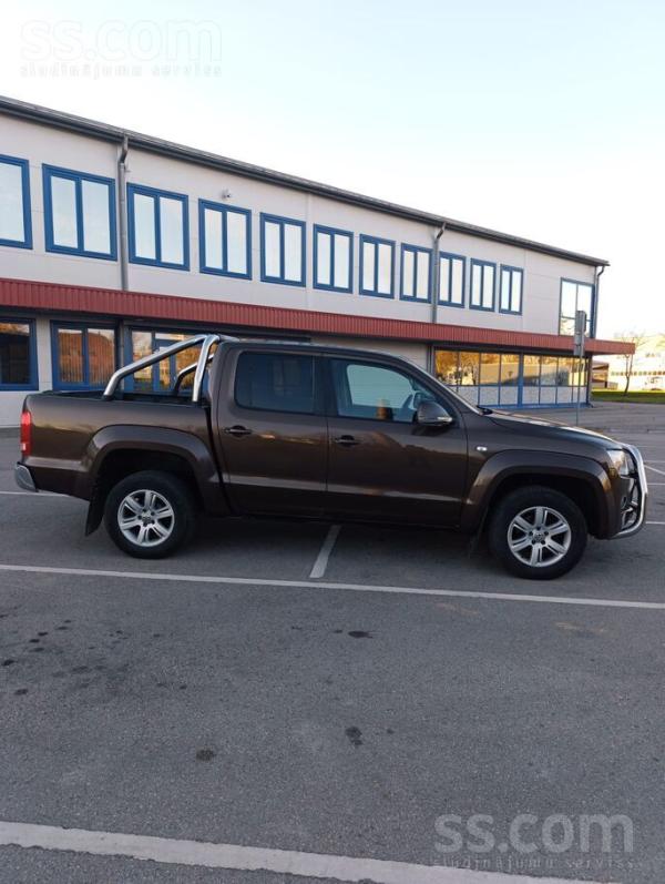Brown Volkswagen Amarok 2012 in Rezekne, with an engine capacity of 2.00 L and mileage of 456 thousand km for 6500 €, photo 1 on AUTOMOTO.COM.LV