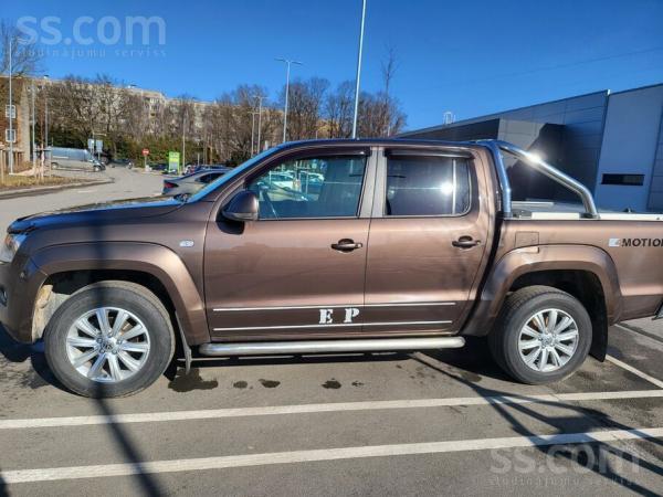 Brown Volkswagen Amarok 2013 in Riga, with an engine capacity of 2.00 L and mileage of 132 thousand km for 15400 €, photo 3 on AUTOMOTO.COM.LV