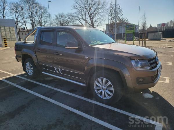 Brown Volkswagen Amarok 2013 in Riga, with an engine capacity of 2.00 L and mileage of 132 thousand km for 15400 €, photo 8 on AUTOMOTO.COM.LV