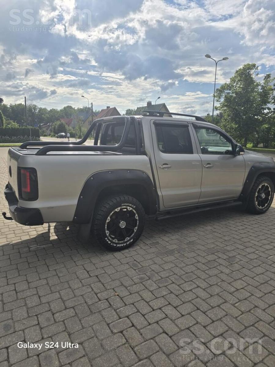 Brown Volkswagen Amarok 2013 in Cesis, with an engine capacity of 2.00 L and mileage of 210 thousand km for 7000 €, photo 3 on AUTOMOTO.COM.LV