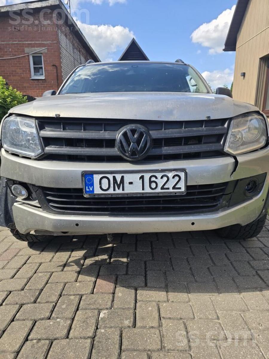 Brown Volkswagen Amarok 2013 in Cesis, with an engine capacity of 2.00 L and mileage of 210 thousand km for 7000 €, photo 7 on AUTOMOTO.COM.LV