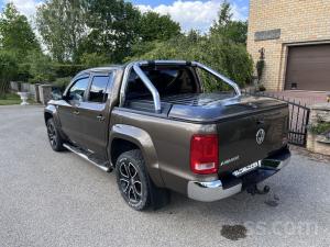 Brown Volkswagen Amarok 2015 in Talsi, with an engine capacity of 2.00 L and mileage of 301 thousand km for 7900 €, photo 4 on AUTOMOTO.COM.LV