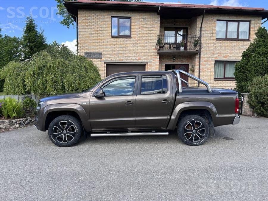 Brown Volkswagen Amarok 2015 in Talsi, with an engine capacity of 2.00 L and mileage of 301 thousand km for 7900 €, photo 5 on AUTOMOTO.COM.LV