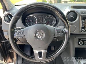 Brown Volkswagen Amarok 2015 in Talsi, with an engine capacity of 2.00 L and mileage of 301 thousand km for 7900 €, photo 8 on AUTOMOTO.COM.LV