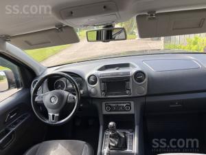 Brown Volkswagen Amarok 2015 in Talsi, with an engine capacity of 2.00 L and mileage of 301 thousand km for 7900 €, photo 14 on AUTOMOTO.COM.LV