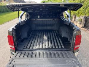 Brown Volkswagen Amarok 2015 in Talsi, with an engine capacity of 2.00 L and mileage of 301 thousand km for 7900 €, photo 15 on AUTOMOTO.COM.LV