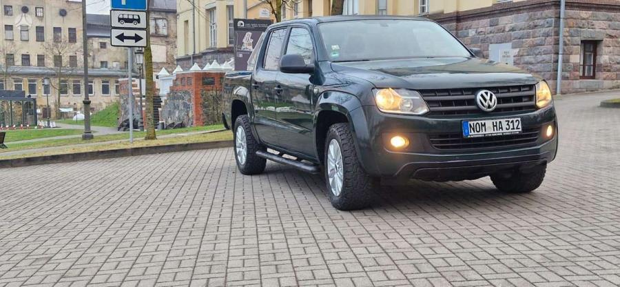 Green Volkswagen Amarok 2014 in Kelme, with an engine capacity of 2.00 L and mileage of 247 thousand km for 10900 €, photo 4 on AUTOMOTO.COM.LV