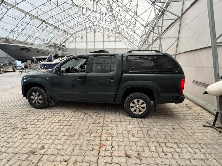 Green Volkswagen Amarok 2014 in Riga, with an engine capacity of 2.00 L and mileage of 332 thousand km for 3500 €, photo 1 on AUTOMOTO.COM.LV