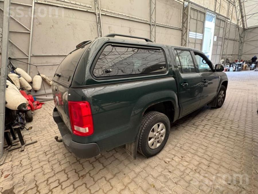 Green Volkswagen Amarok 2014 in Riga, with an engine capacity of 2.00 L and mileage of 332 thousand km for 3500 €, photo 5 on AUTOMOTO.COM.LV